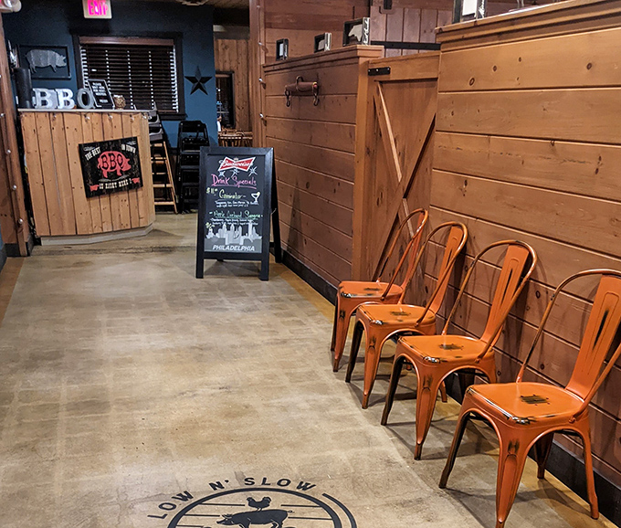 Industrial orange chairs line the waiting area, where the anticipation of smoked meats is almost as delicious as the meal itself.