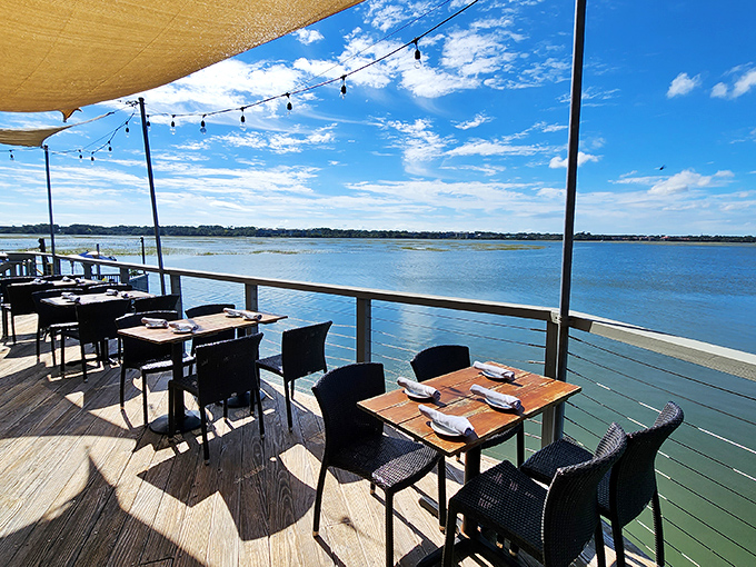 Waterfront dining that makes you question every meal you've ever eaten without a view of rippling blue water stretching to the horizon.