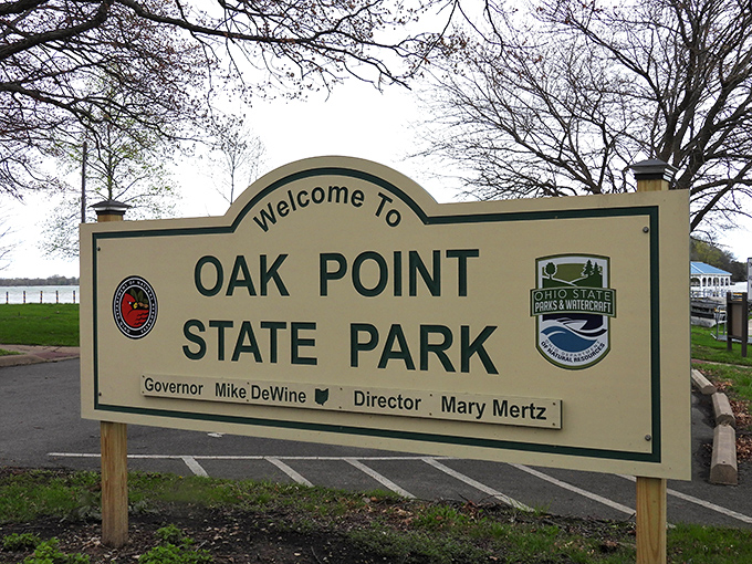 The most honest advertising in Ohio—this welcome sign promises exactly what awaits: a point, some oaks, and state park perfection.