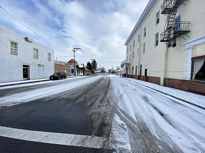 Winter transforms Alturas streets into monochrome paintings, where locals navigate slush with the casual expertise of those who've seen it all before.
