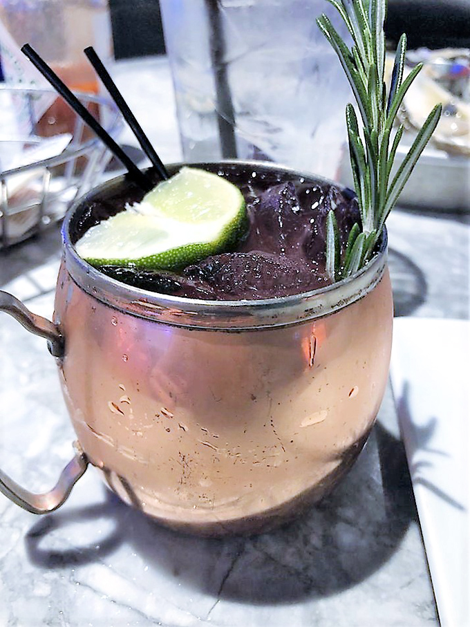 This Moscow Mule with rosemary isn't just a drink; it's a copper-clad invitation to linger longer than you planned.