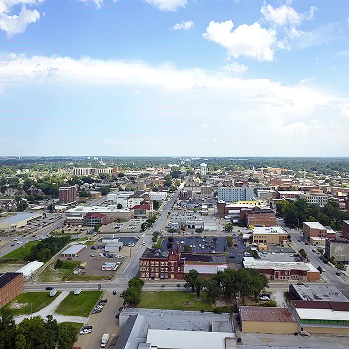 From above, Quincy reveals itself as a perfect grid of Midwestern pragmatism softened by generous tree canopy and the mighty Mississippi's curves.