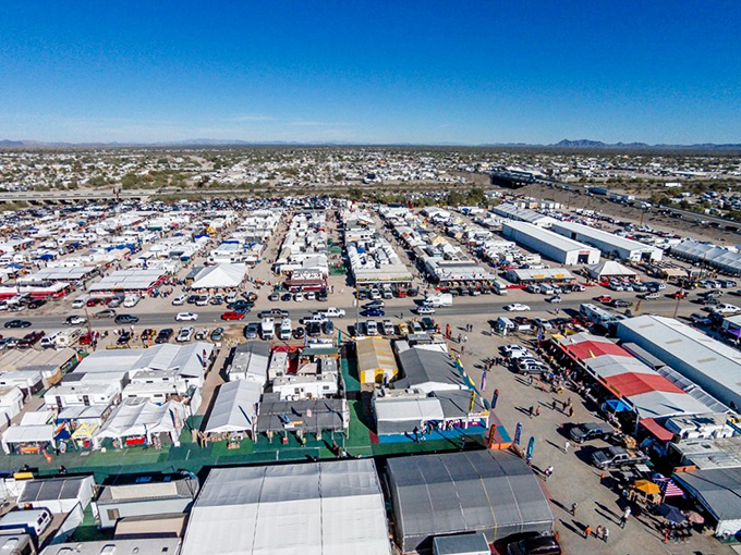 From above, the true scale of this desert phenomenon reveals itself&mdash;a temporary city of white tents and dreams stretching toward the horizon.