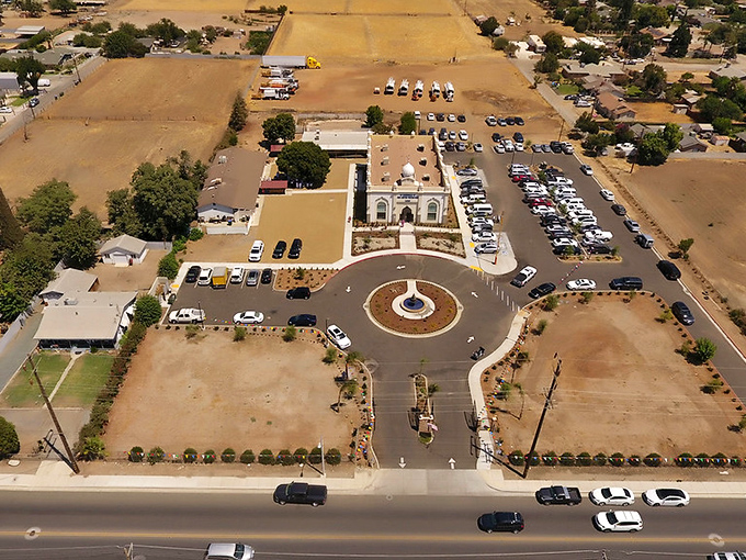 From above, Porterville reveals its thoughtful layout, with this impressive structure standing as a centerpiece surrounded by California's golden hills.