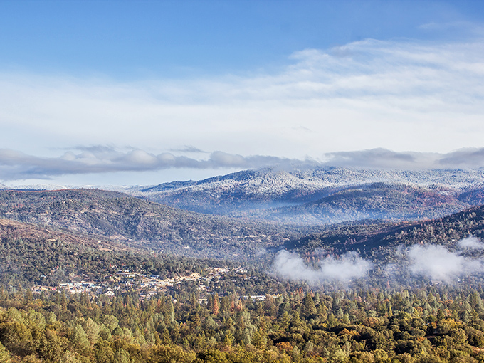The Sierra Nevada foothills unfold like nature's quilt, with Oakhurst nestled in its folds like a town that knows exactly where it belongs.