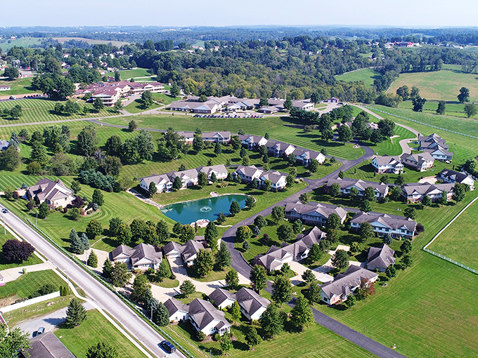 From above, even modern development reveals thoughtful planning &ndash; homes gathered around water like settlers around a campfire.