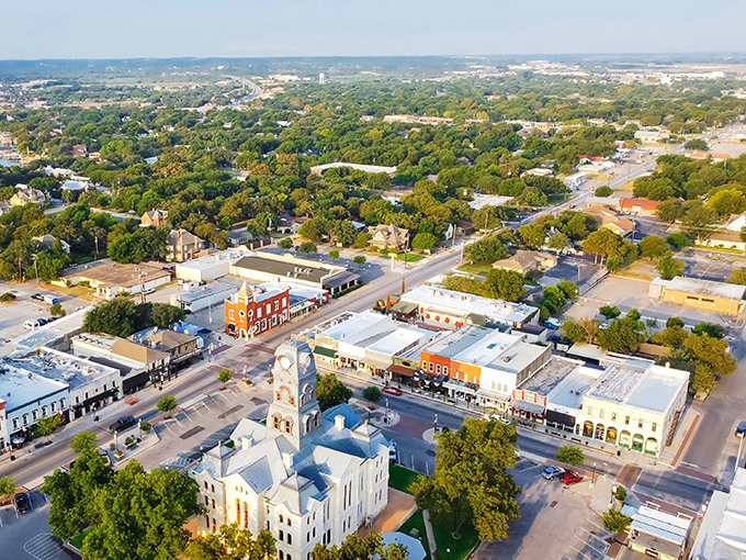From above, Granbury reveals its perfect layout—historic courthouse commanding center stage while tree-lined neighborhoods stretch toward the horizon.