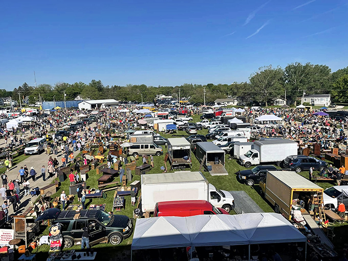 The aerial view reveals the magnificent scale of Wisconsin's premier antique hunting grounds. Hundreds of vendors, thousands of shoppers, and millions of memories.
