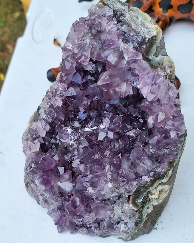 Nature's purple masterpiece revealed. This stunning amethyst geode showcases millions of years of geological patience and mineral artistry.