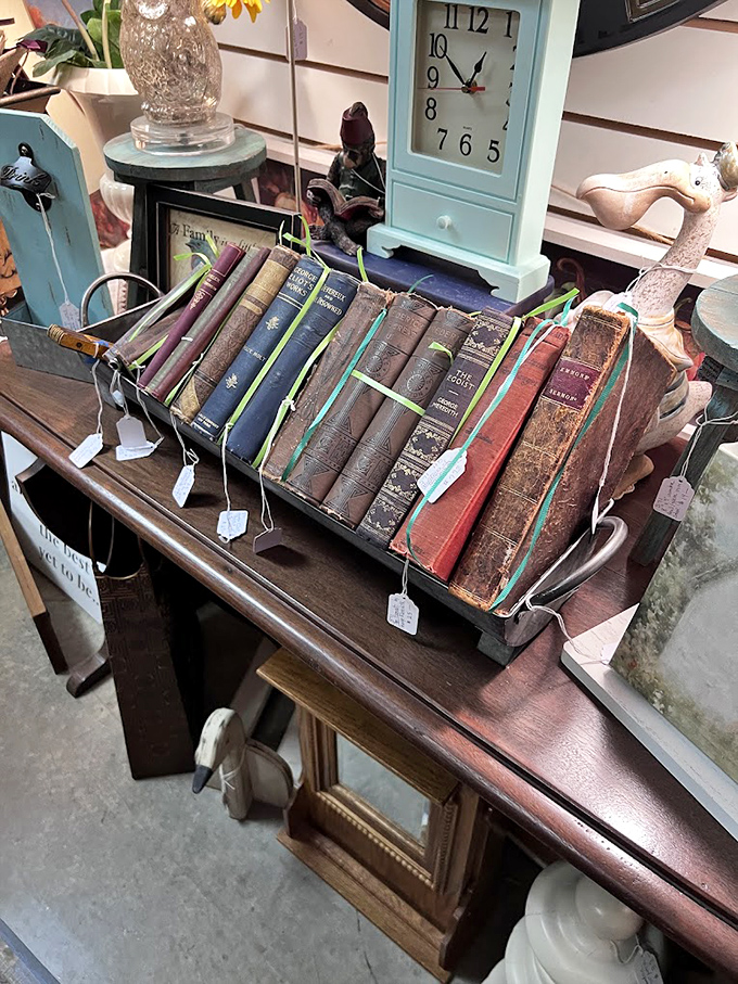 Leather-bound wisdom waits patiently on a polished table, each book a time capsule of ideas, language, and the unmistakable scent of history.