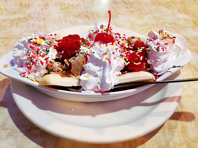 This banana split isn't dessert&mdash;it's a celebration with whipped cream confetti, sprinkle streamers, and cherries on top.