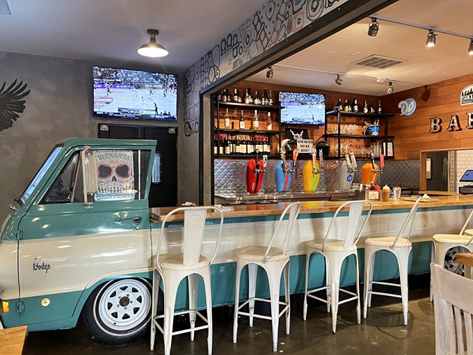 The bar area features yet another vintage vehicle, proving that at Smokey and The Brisket, automotive nostalgia pairs perfectly with craft beer.