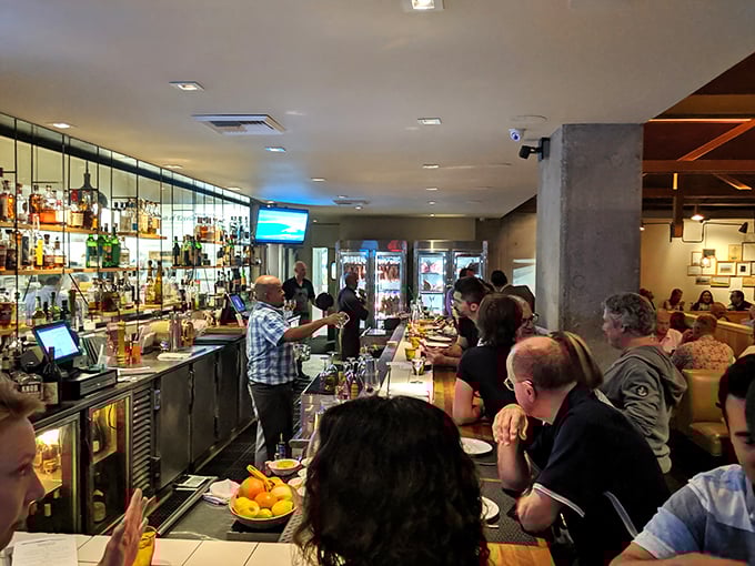 The bustling bar scene&mdash;where strangers become friends and cocktails flow freely. The energy here is as intoxicating as what's in the glasses.