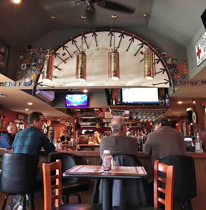 The bar's copper fire extinguishers hanging overhead aren't just decoration&mdash;they're a promise that the only heat you'll feel is from the delicious food.