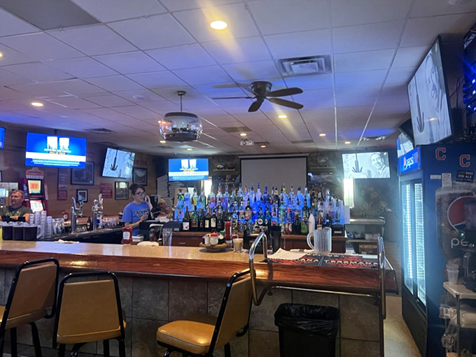 The bar at The Crow's Nest isn't just where drinks are served; it's where strangers become friends and "just one more" becomes a mantra.