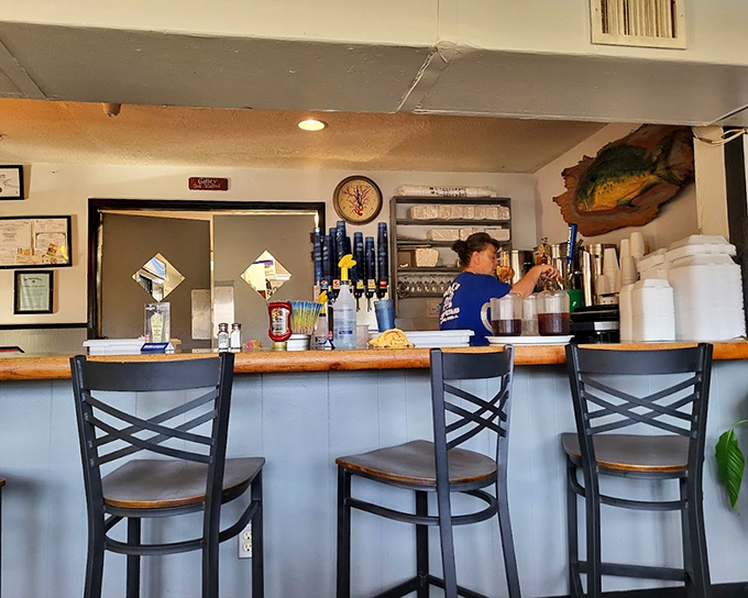 The bar area feels like that perfect neighborhood spot where everybody might not know your name yet, but they'll remember your order.