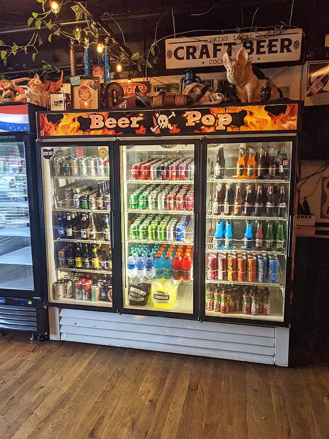A beverage case that understands sometimes you need something cold to tame the fire of good BBQ. That pig statue standing guard is the perfect touch.