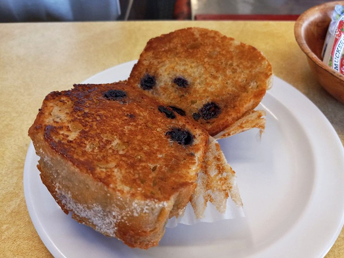 Even the blueberry toast at Nick's has personality—those berries peeking through like edible polka dots on perfectly golden bread. Simple pleasures, perfectly executed.