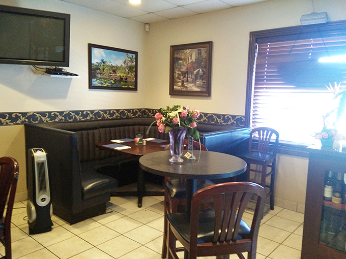 Cozy booths where countless conversations, celebrations, and first dates have unfolded over plates of those legendary scallops.