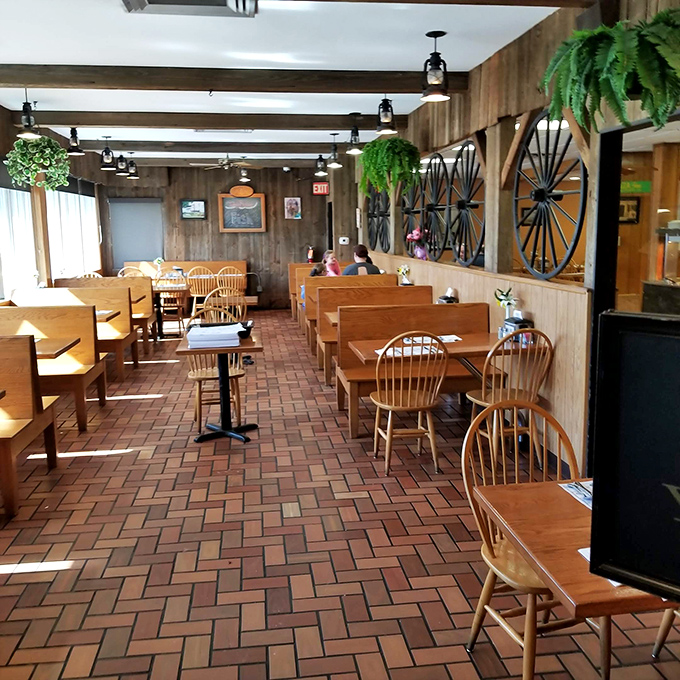 Wagon wheel d&eacute;cor and wooden booths create an atmosphere that says, "Sit down, stay awhile, and yes, you should definitely order dessert."