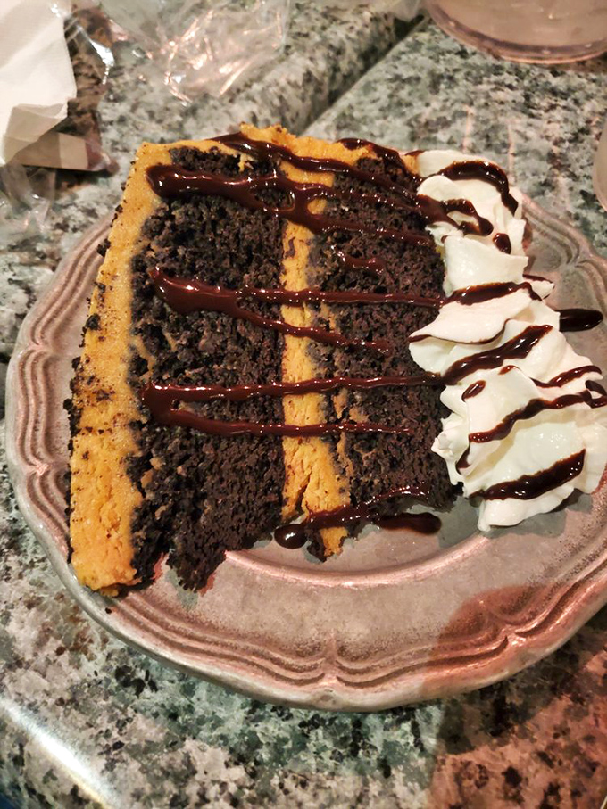 A slice of cake that doesn't just end the meal&mdash;it provides the exclamation point. That chocolate drizzle is writing love letters to your taste buds.