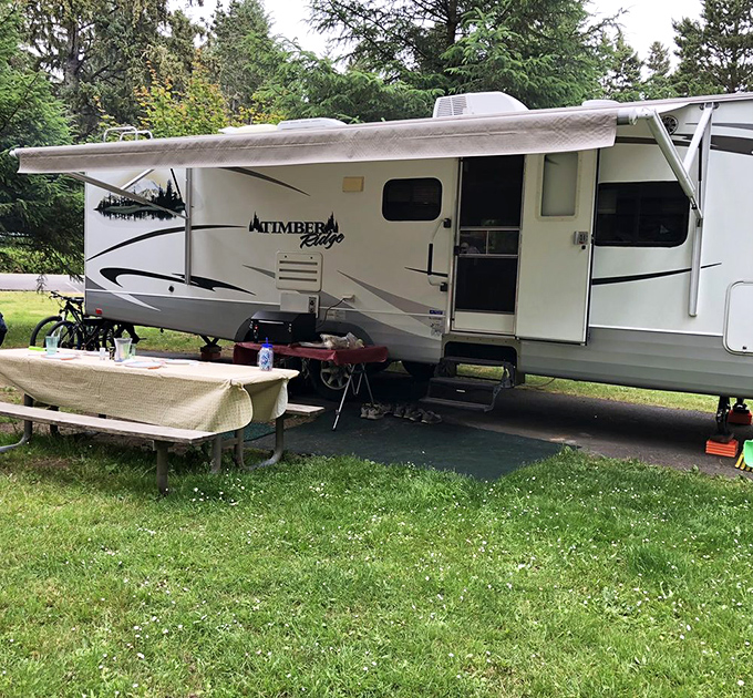 Camping at Fort Stevens: where your RV becomes a front-row seat to nature's greatest hits, complete with pine-scented air conditioning.