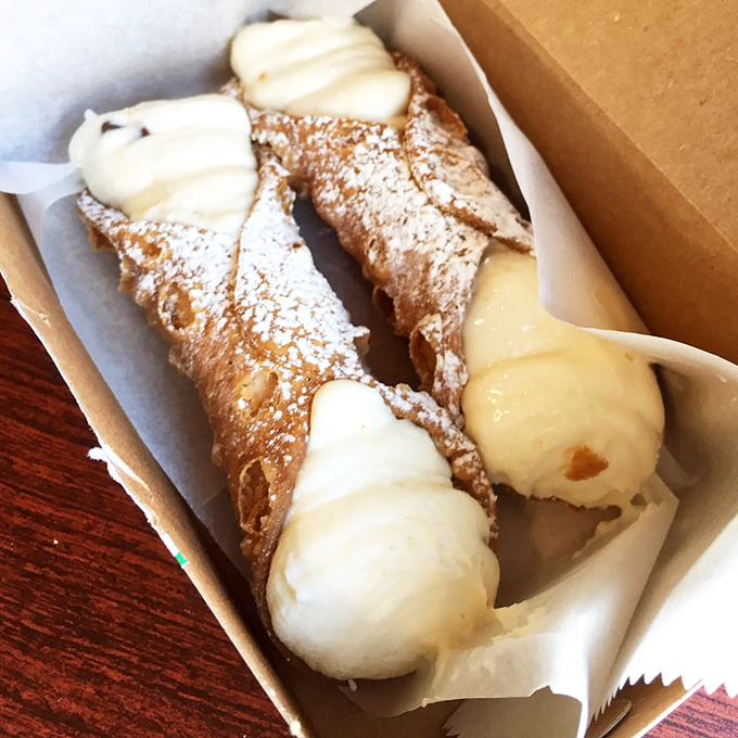 Cannoli so authentic they should come with their own passport. Crisp shells filled to order, ensuring that perfect contrast of crunch and cream.