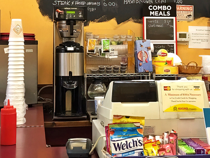 Coffee station and register: the final checkpoint before culinary bliss, where friendly exchanges and exact change are equally appreciated.