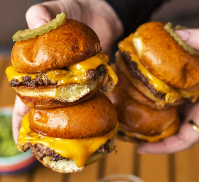 Sliders that prove good things come in small packages. Like miniature masterpieces of beef, cheese, and bun&mdash;multiplied for maximum joy.