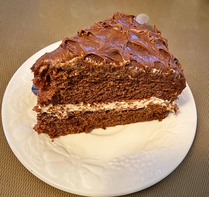 Plot twist! Beyond seafood excellence lurks this chocolate layer cake &ndash; rich, decadent, and the perfect sweet finale to a savory seafood symphony.