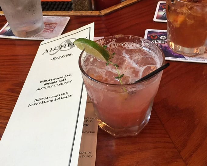 This isn't just a cocktail; it's a conversation starter in a glass, garnished with lime and mint that hint at refreshment before you even take a sip.