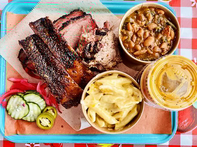 The BBQ combo platter&mdash;nature's perfect meal. Ribs, brisket, beans, and mac and cheese create a flavor quartet that performs in perfect harmony.