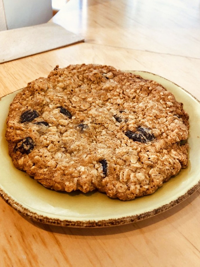 The oatmeal raisin cookie that launched a thousand return visits – crisp edges, chewy center, and big enough to share (though you probably won't want to).