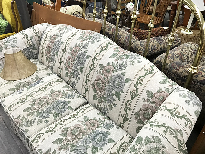 This floral couch has stories to tell. With its vintage charm intact, it's waiting for a second act in someone's living room&mdash;perhaps yours?