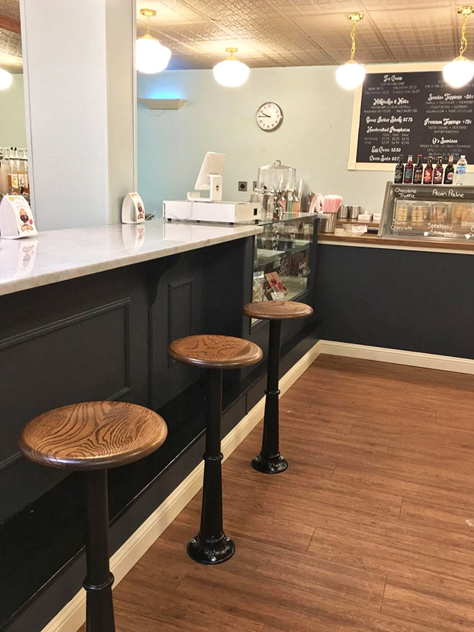 Counter seating &ndash; where the magic happens. Those wooden stools have witnessed countless first dates, celebrations, and sugar-induced epiphanies.