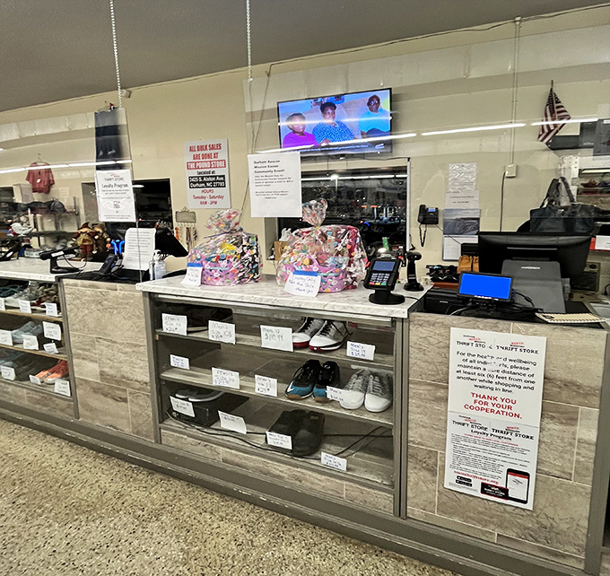 The checkout counter: where treasure hunters complete their quests, knowing their purchases support more than just their vintage vinyl addiction.