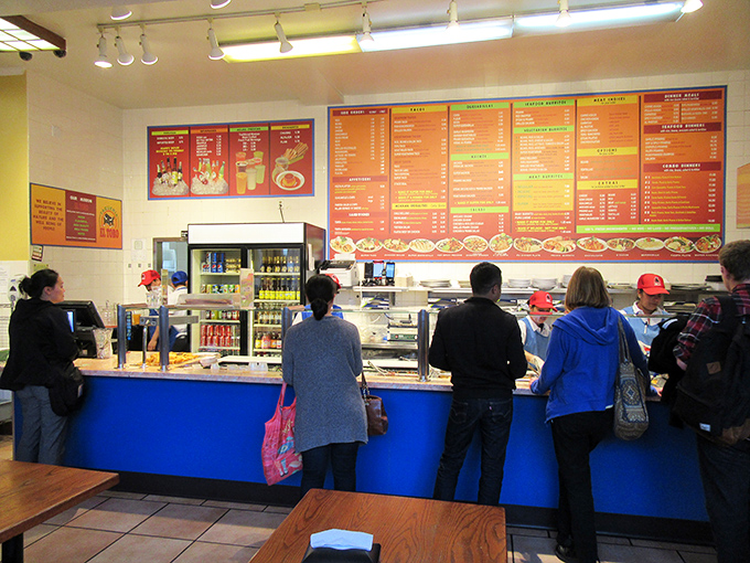 The ordering counter&mdash;where dreams are spoken aloud and transformed into foil-wrapped reality by the wizards behind the blue partition.