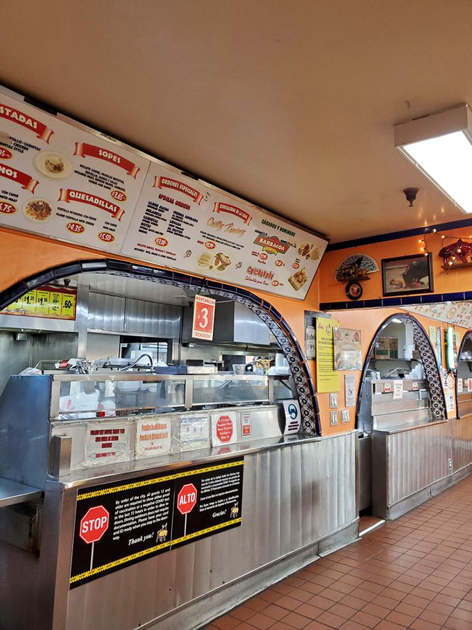 Where the magic happens. This counter has witnessed thousands of first-time visitors transform into lifelong devotees with just one perfectly assembled order.