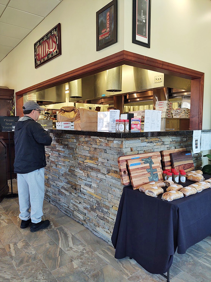 The pickup counter &ndash; that magical portal where takeout dreams materialize in cardboard boxes, ready to transform your Tuesday night into something special.