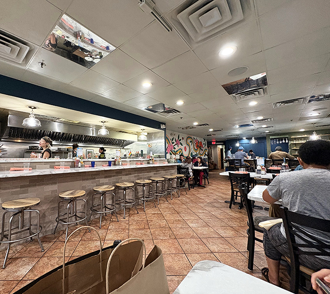 Counter seating: where breakfast voyeurs can watch kitchen magic happen while contemplating the profound relationship between coffee and civilization. 