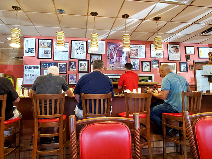The counter seating&mdash;where solo diners become temporary neighbors and the rhythm of short-order cooking becomes the soundtrack to your meal.