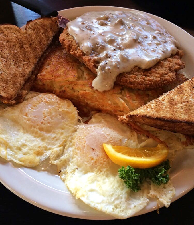 Country fried chicken with gravy that could make a vegetarian question their life choices, served with eggs sunny as an Ohio summer.
