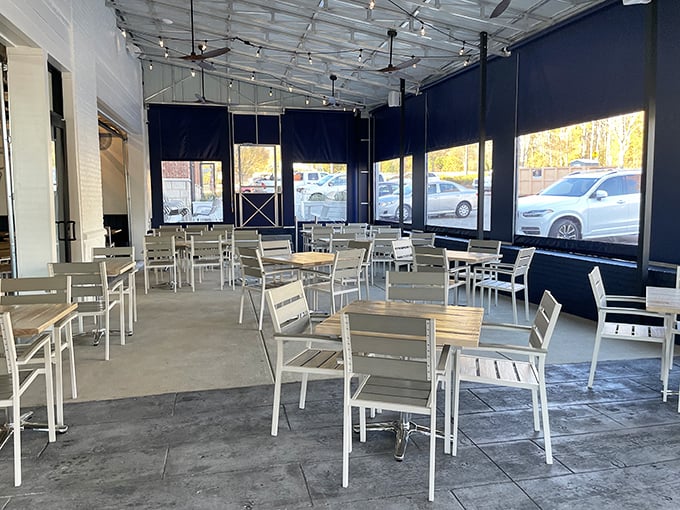 The covered patio offers al fresco dining without weather worries. Simple white furniture lets the food (and your conversation) remain the colorful centerpiece.