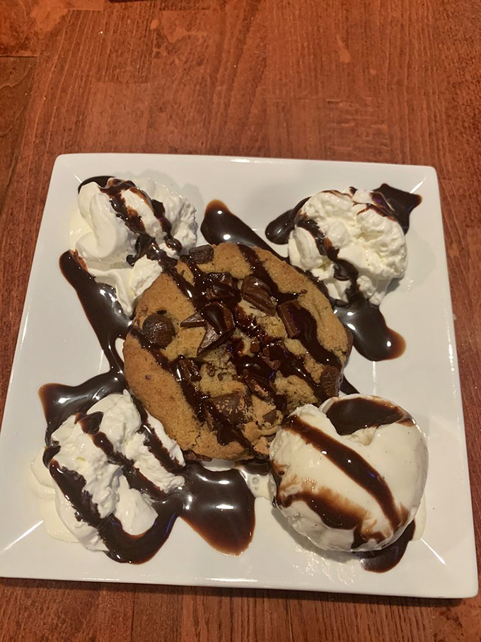 A cookie that clearly went to finishing school. Four scoops of ice cream aren't excessive &ndash; they're necessary companions for that chocolate drizzle.