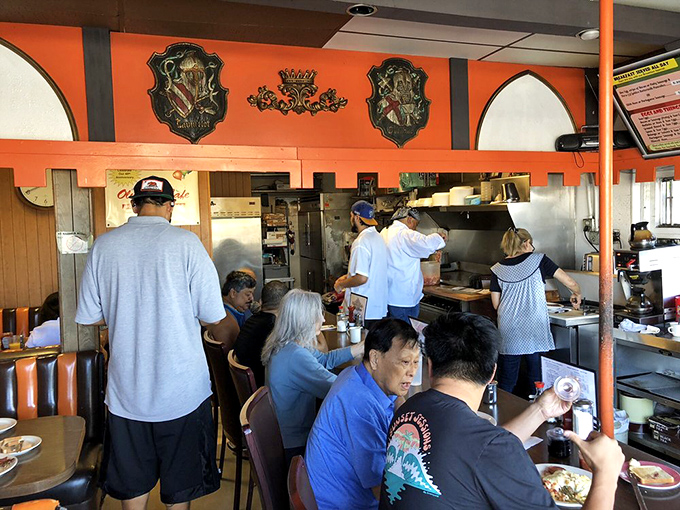 Where the magic happens: cooks working their breakfast alchemy while diners wait in anticipation. This is breakfast theater at its finest.