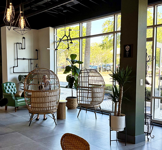 Wicker egg chairs create private breakfast sanctuaries by sun-drenched windows &ndash; the breakfast equivalent of first-class seating in Kissimmee.