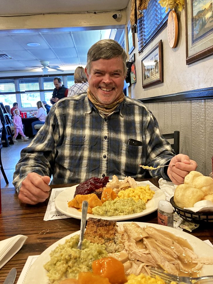 The true measure of a great restaurant: the genuine smile of a satisfied customer. This is the face of someone who's found their happy place.
