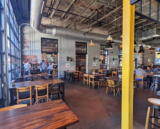 A dining room where barbecue dreams come true. Those yellow accents add just enough sunshine to brighten your meat-induced happiness.