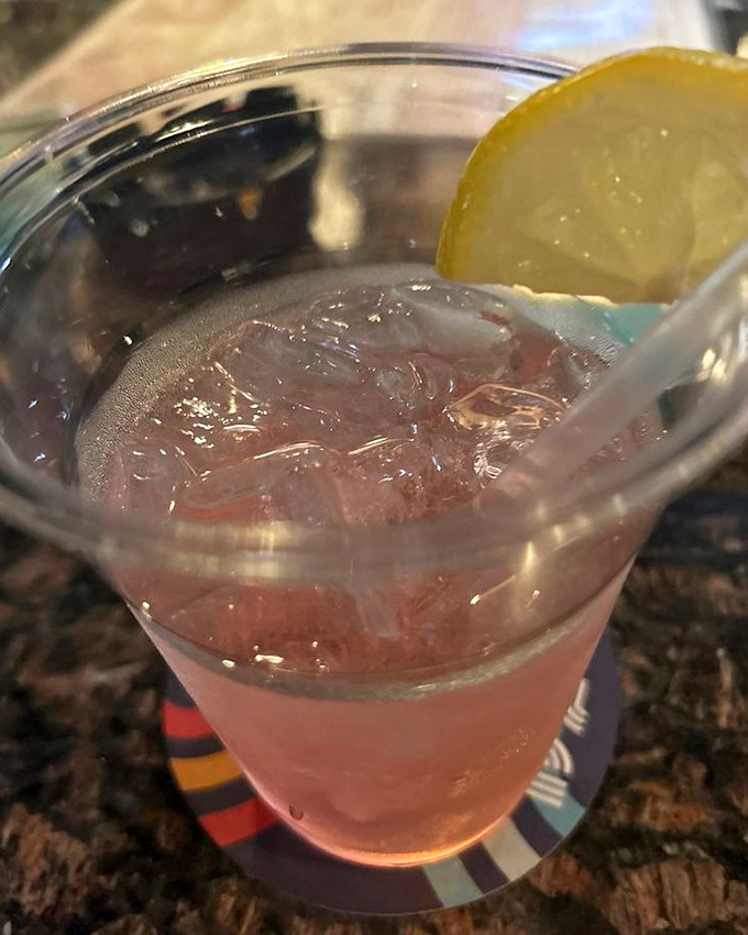 The perfect companion to a serious sandwich session. A cold, refreshing drink with a lemon twist&mdash;because hydration matters when tackling Tony G's menu.