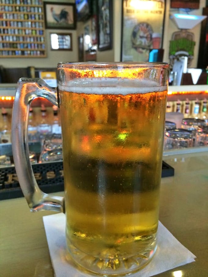 A frosty mug of golden beer catching the light just right&mdash;because sometimes the perfect burger companion isn't another person, but a well-crafted brew.